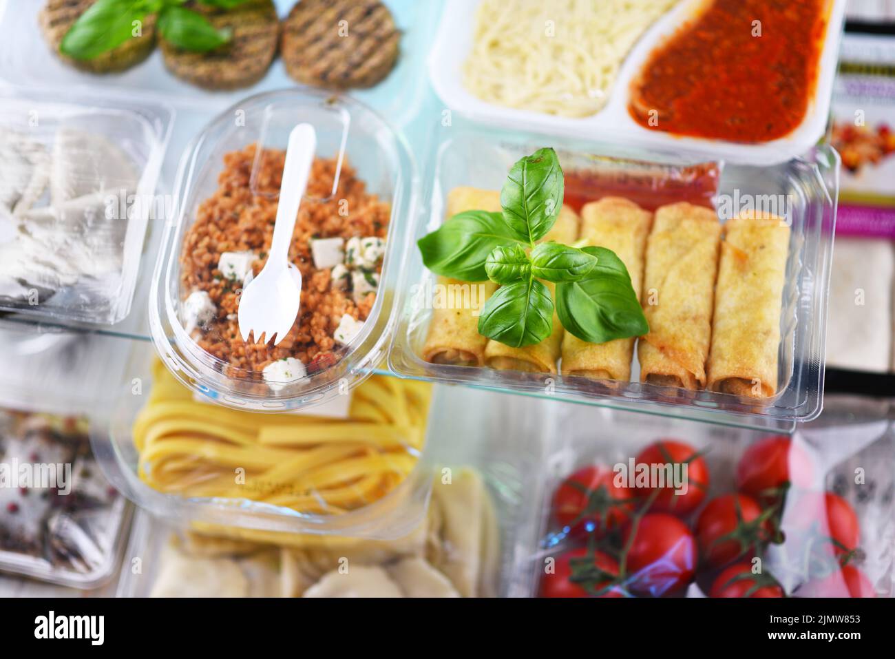 A variety of prepackaged food products in plastic boxes Stock Photo - Alamy