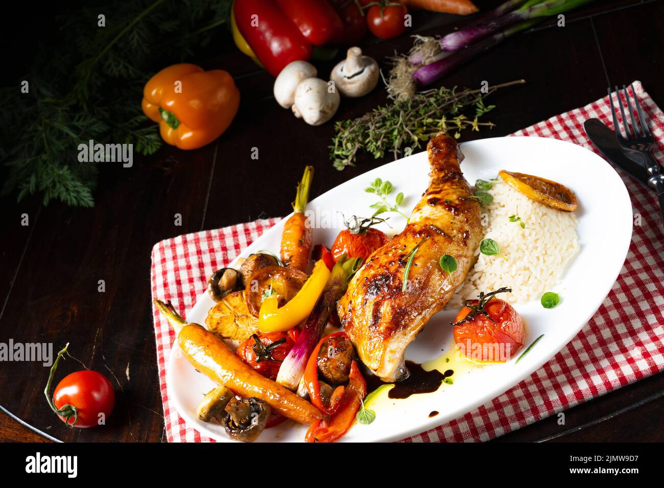 Rustic fried chicken legs with assorted vegetables and rice Stock Photo ...