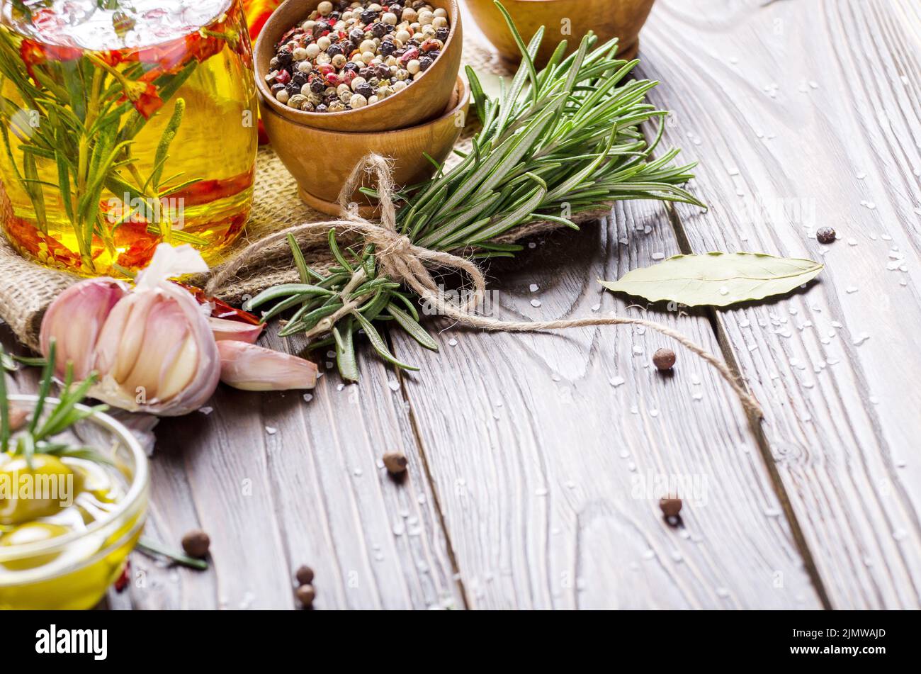 Food background made of condiments and spices on kitchen table. Cooking ...