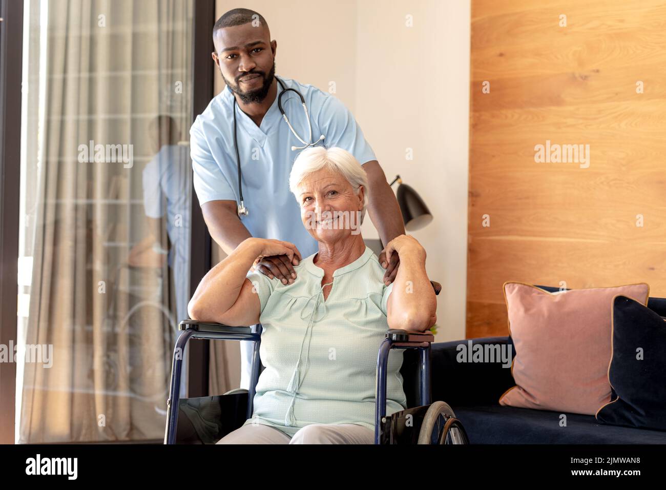 Portrait of african american male health worker and caucasian senior ...
