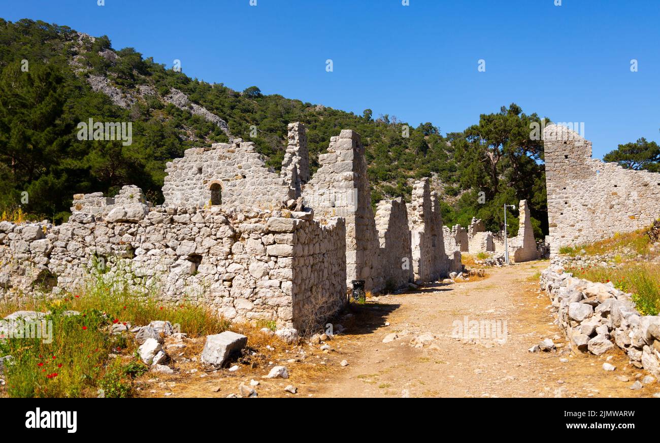Landscape of the ancient city of Olympos. With remaining ruins of walls ...