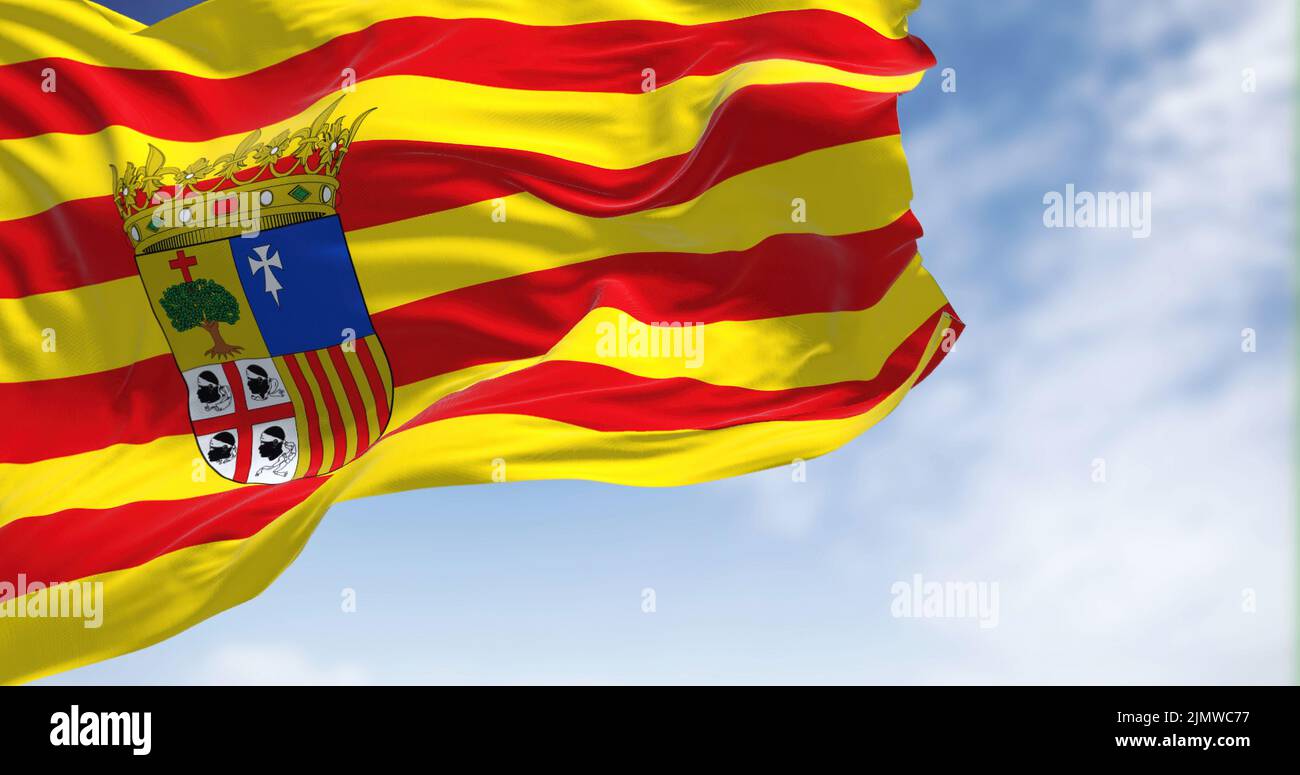 Aragonese flag waving in the wind on a clear day Stock Photo - Alamy
