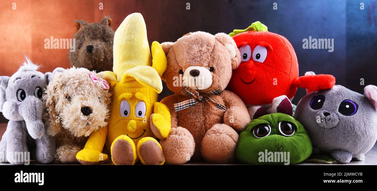 Group of stuffed animal toys in a children's room Stock Photo - Alamy