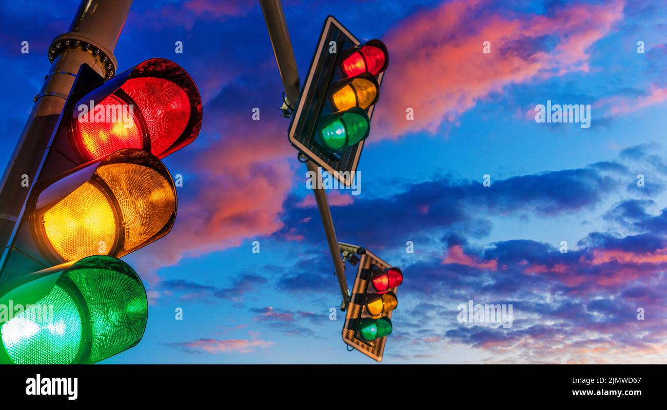 Traffic lights over urban intersection Stock Photo - Alamy