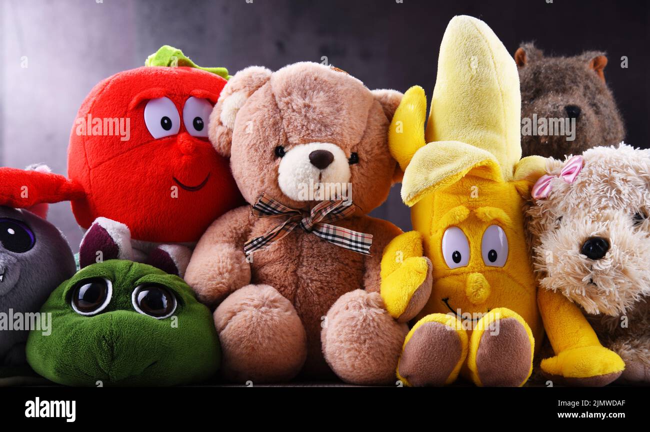 Group of stuffed animal toys in a children's room Stock Photo - Alamy