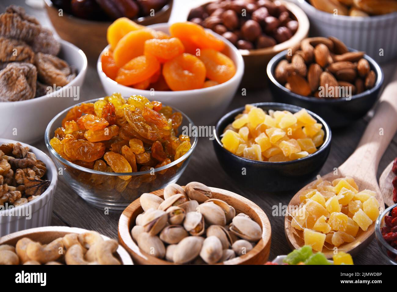Composition with dried fruits and assorted nuts. Delicacies Stock Photo ...