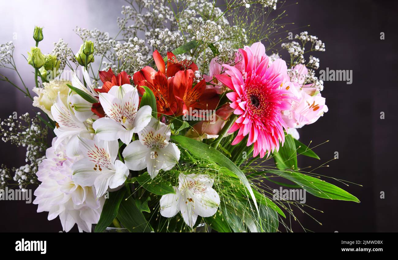 Composition with bouquet of freshly cut flowers Stock Photo - Alamy