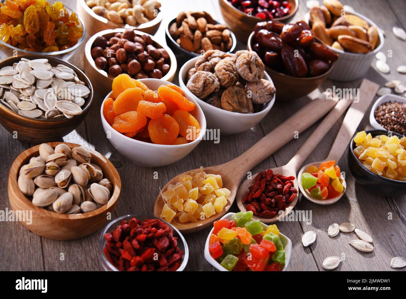 Composition with dried fruits and assorted nuts. Delicacies Stock Photo ...