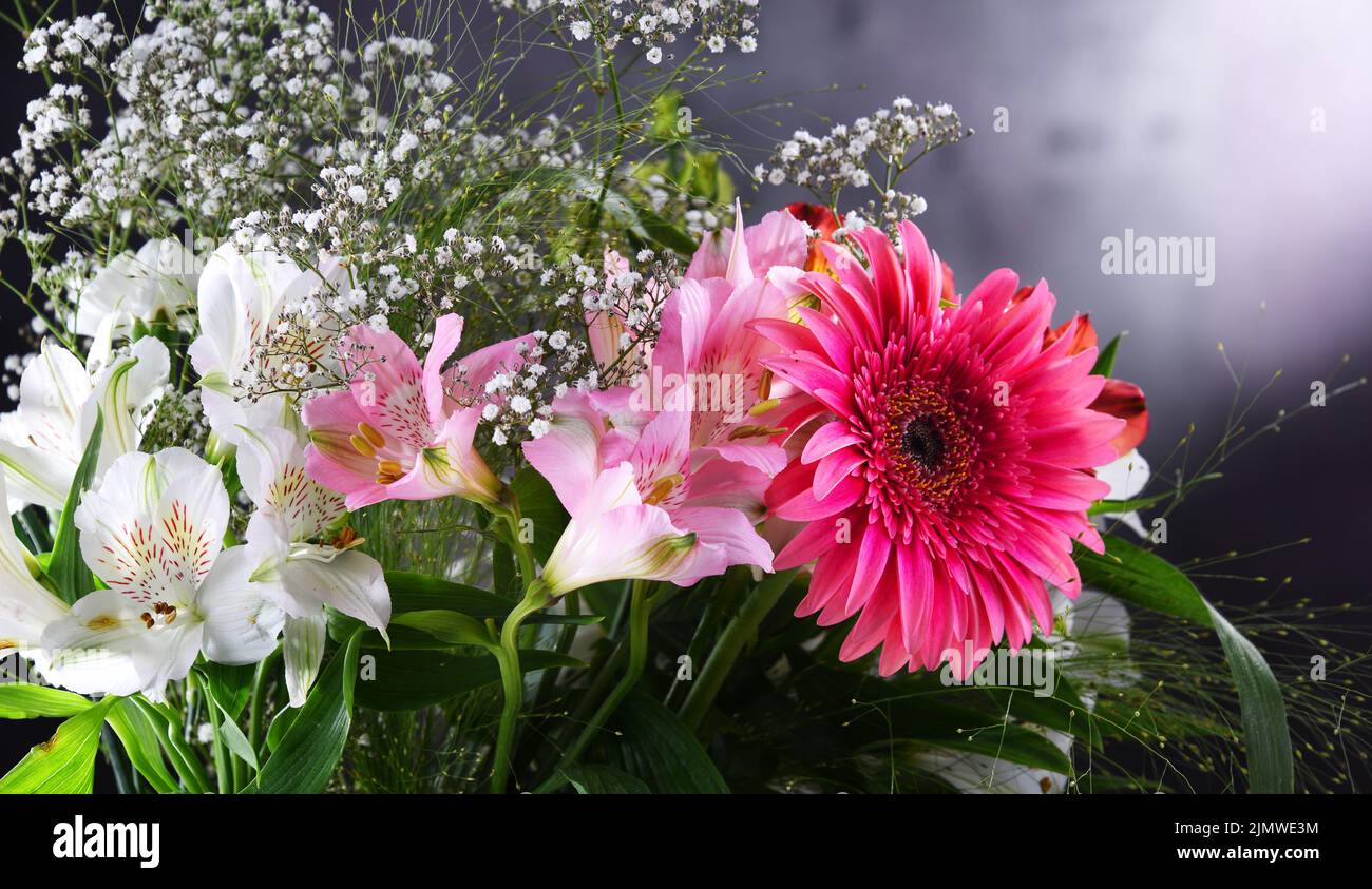 Composition with bouquet of freshly cut flowers Stock Photo - Alamy