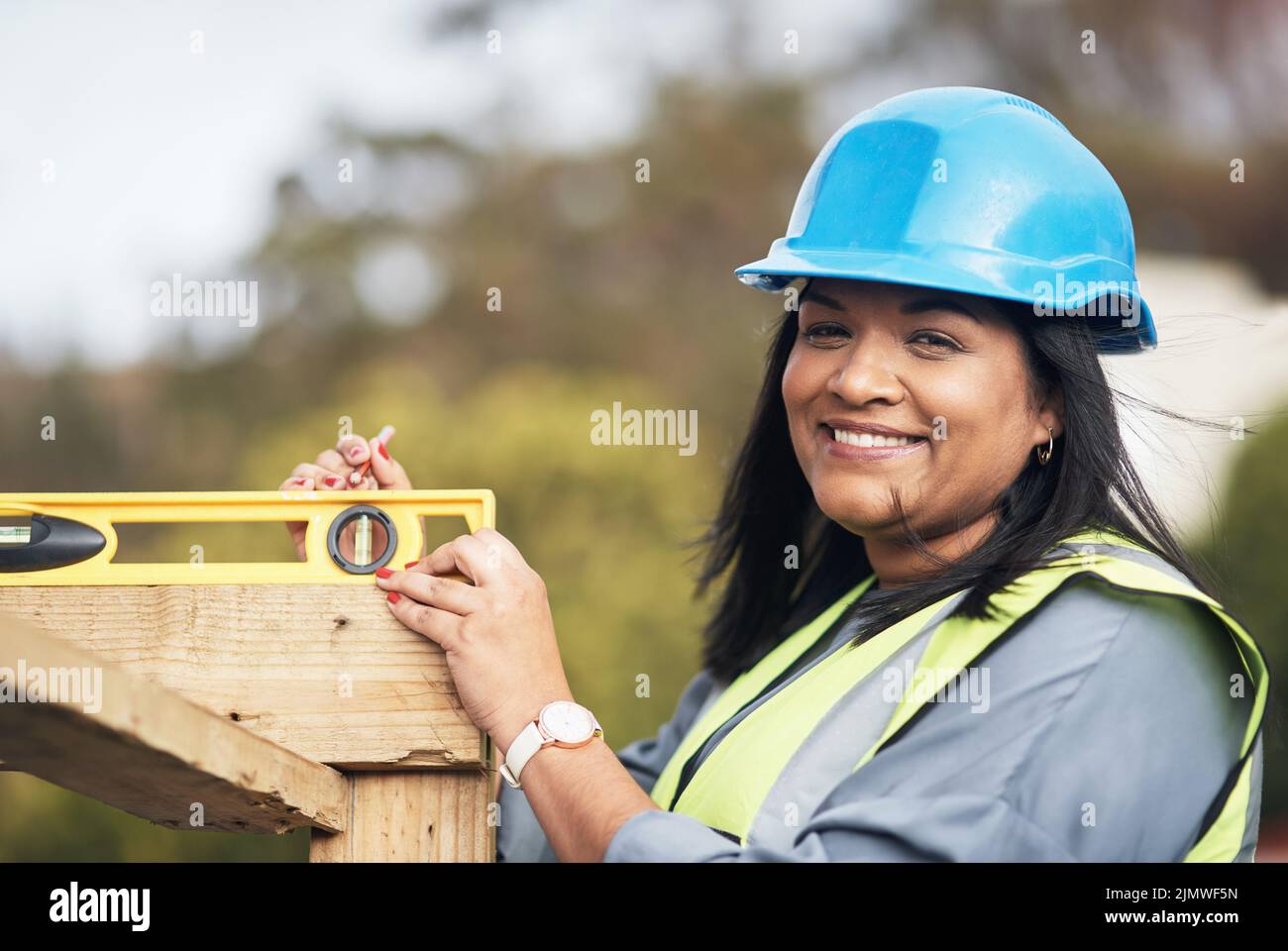 Everything has to be level. Cropped portrait of an attractive young ...