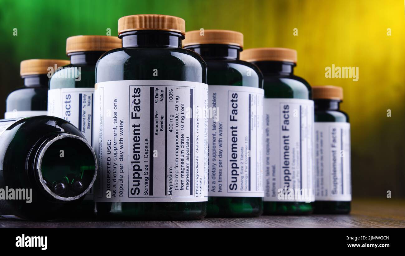 Composition with dietary supplement containers. Drug pills Stock Photo ...