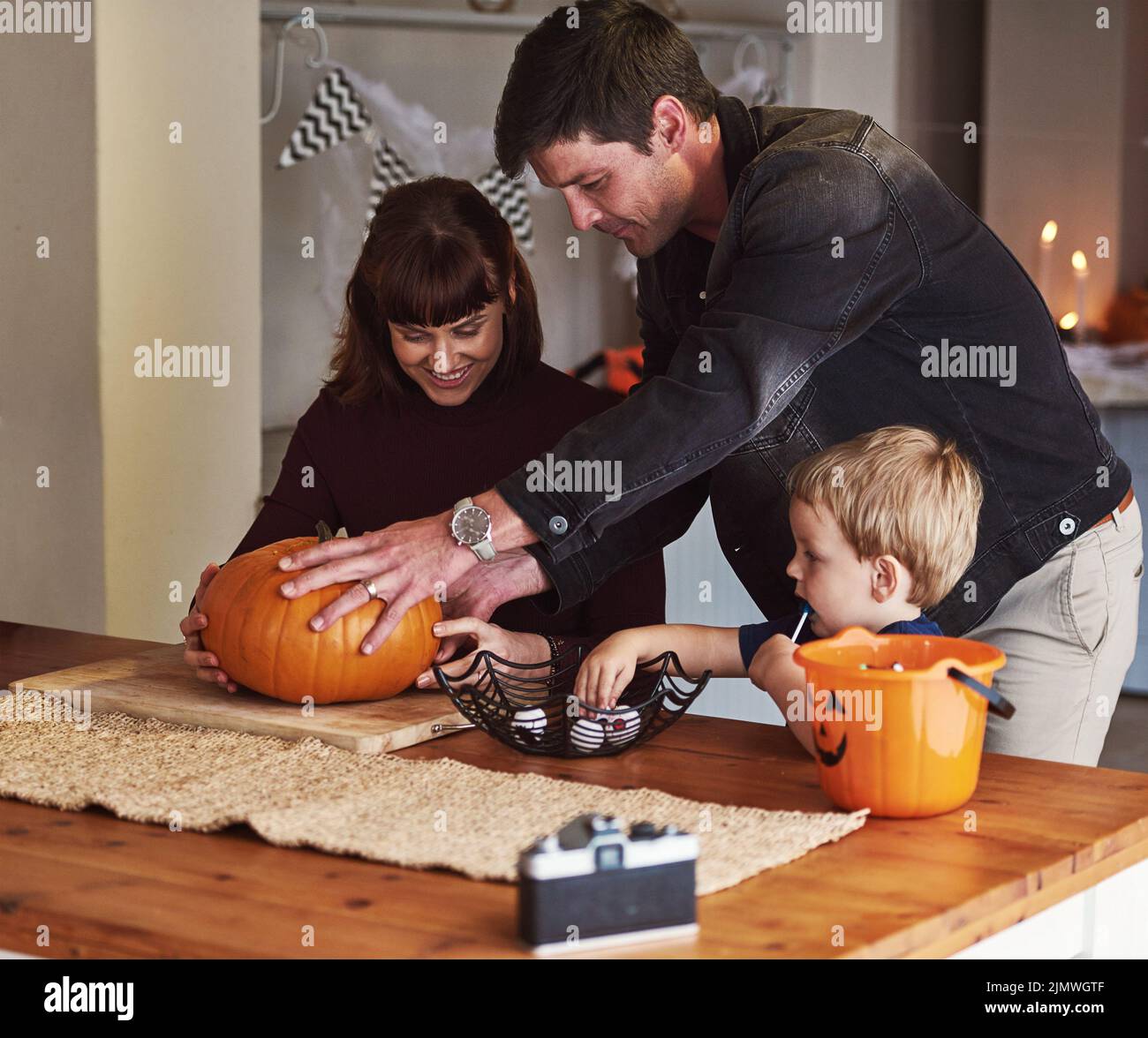 Were getting into the spirit of halloween. an adorable young family ...