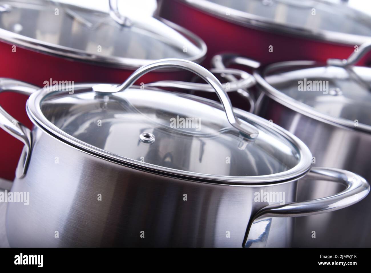 Composition with steel pots Stock Photo - Alamy