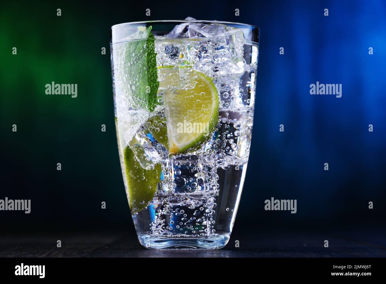 Glass of mineral water with ice Stock Photo - Alamy