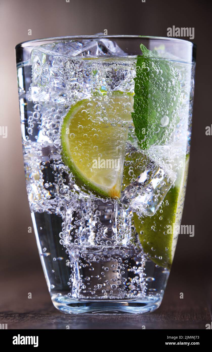 Glass of mineral water with ice Stock Photo - Alamy