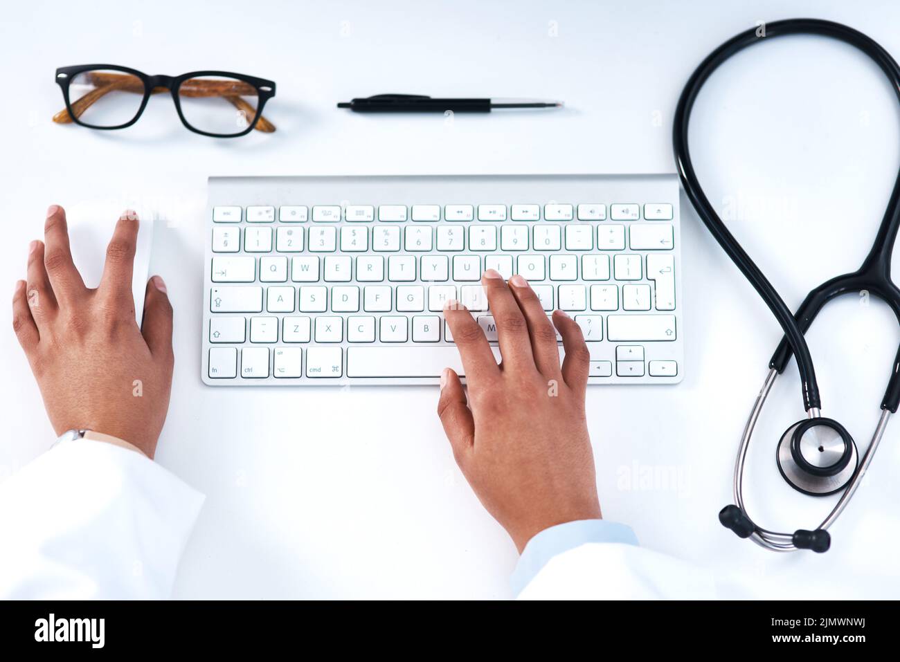 A doctors work never ends. High angle shot of an unrecognisable doctor ...