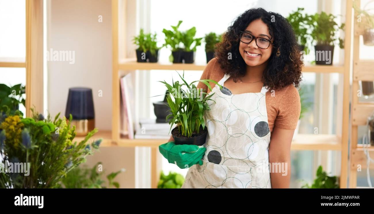 Shes ready to be potted. Cropped portrait of an attractive young female ...
