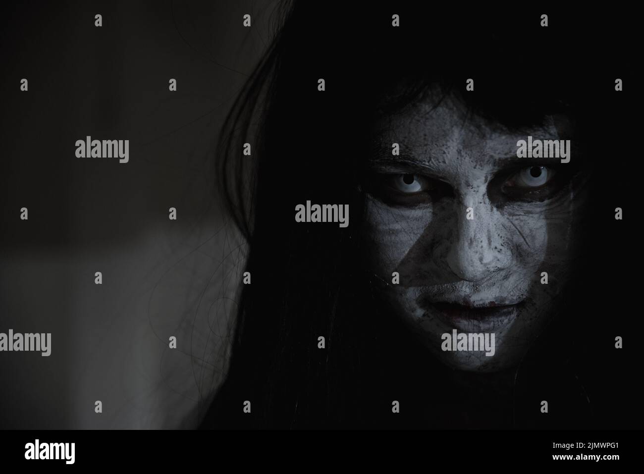 Asian woman ghost or zombie horror creepy scary close up she face and ...