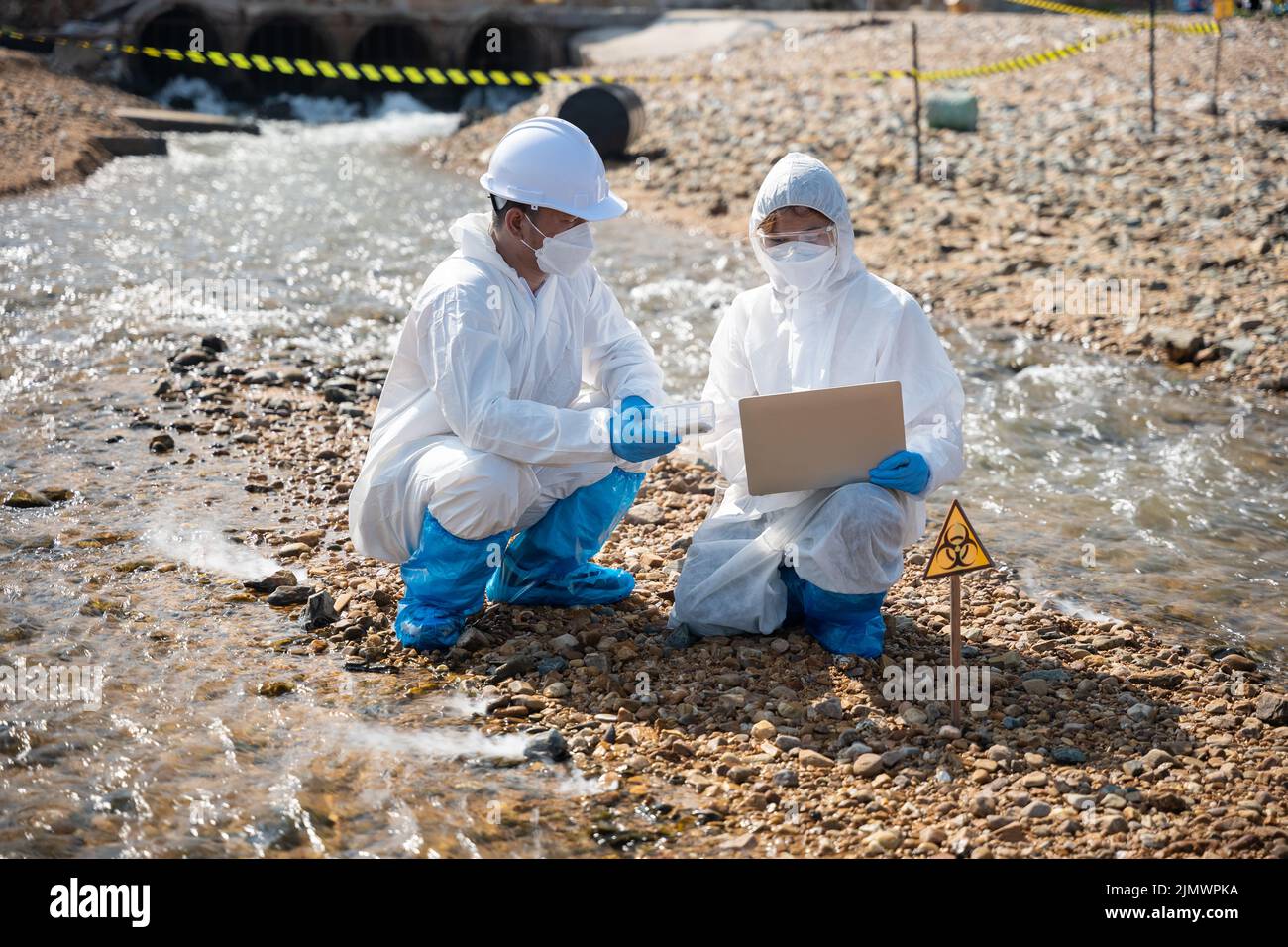 Ecologist sampling taken dead fish to inspaction and save data to ...