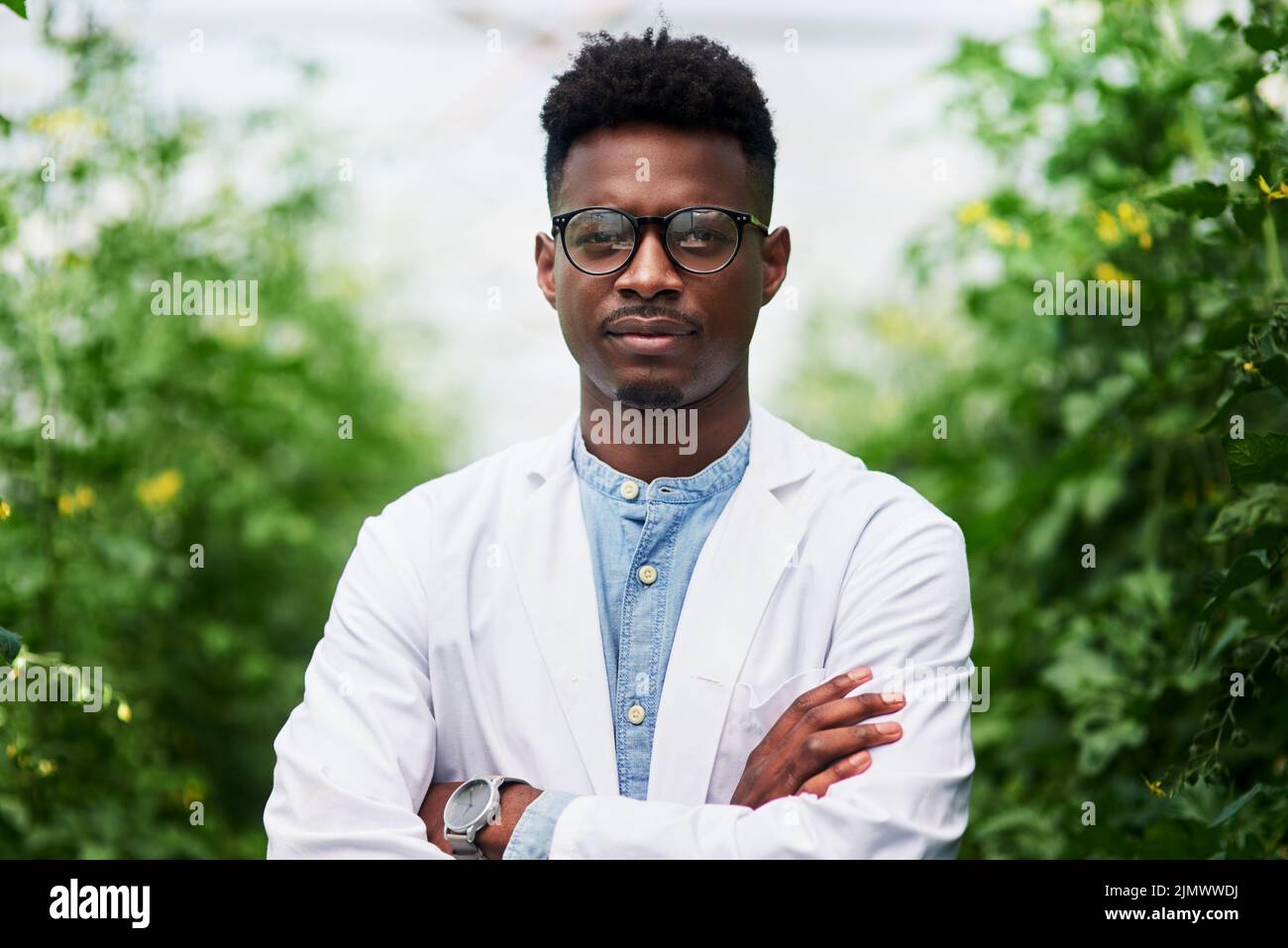 Saving our wonderful earth will always be a serious issue. Portrait of a handsome young botanist ...