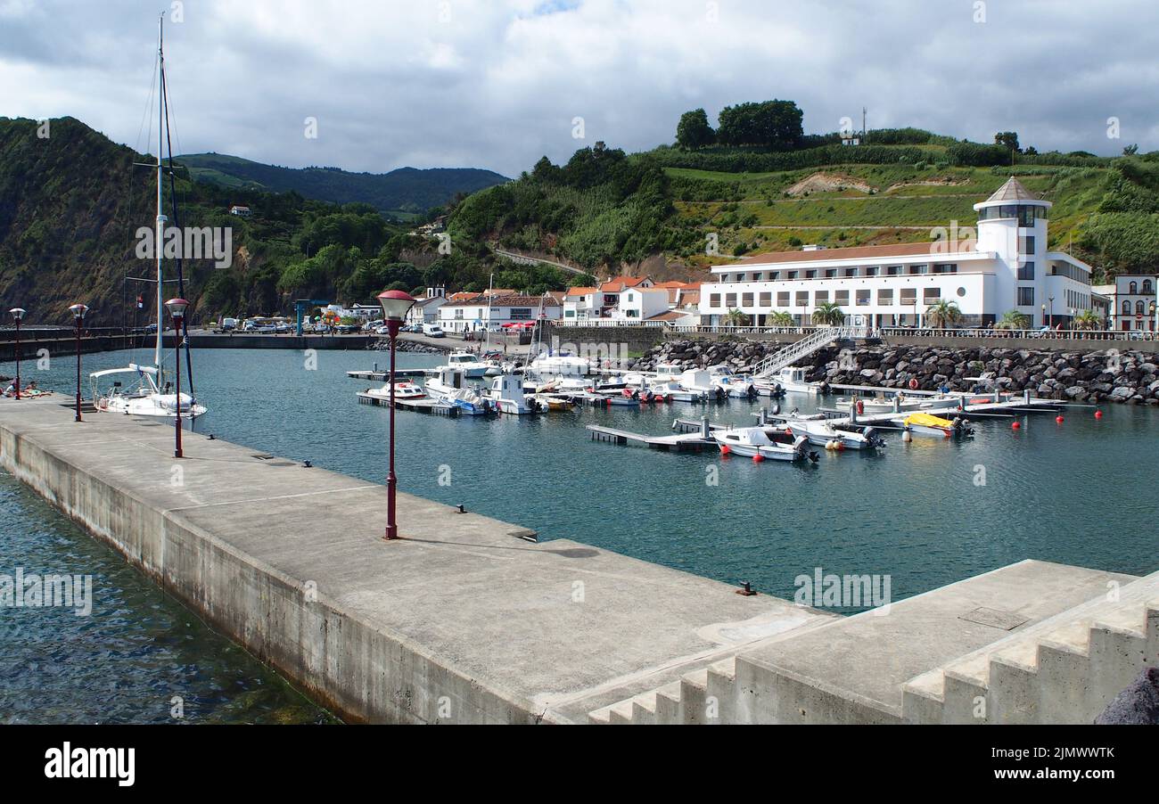 Mooring pier of the marina and the town's waterfront, Povoacao, Sao ...