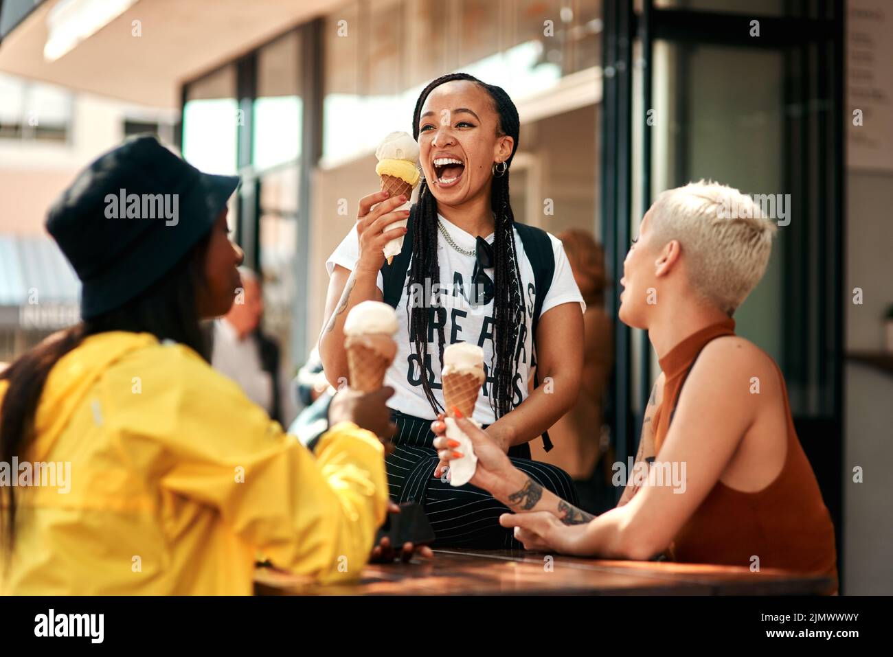 We never say no to getting ice cream. three friends enjoying ice cream ...