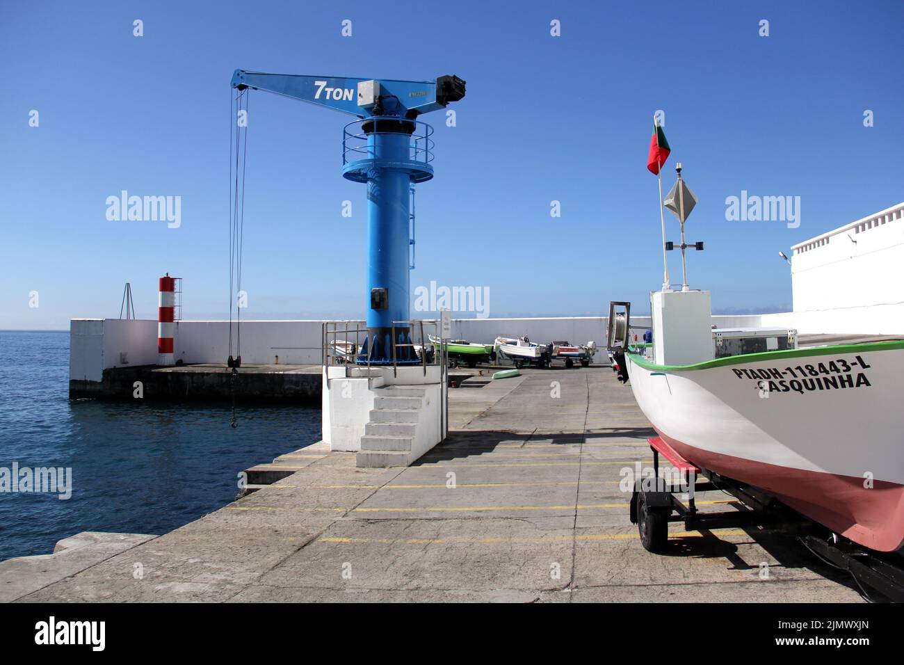 Crane in the fishing port of the town, Porto Judeu, Terceira, Azores ...