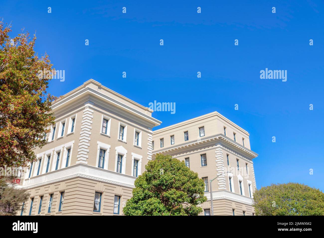 Apartment buildings with georgian style exterior against the blue sky ...
