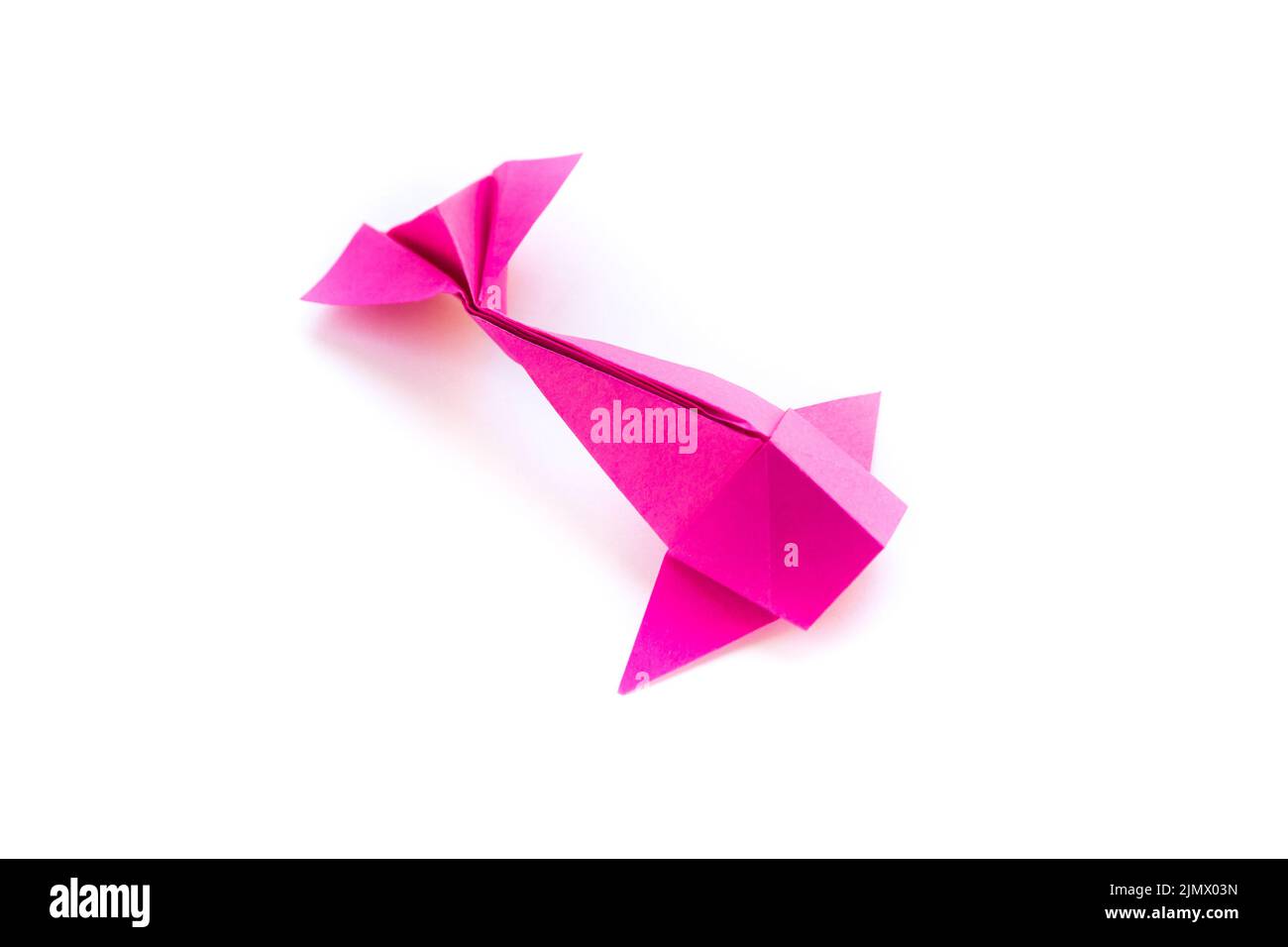 Pink paper fish origami isolated on a white background Stock Photo - Alamy