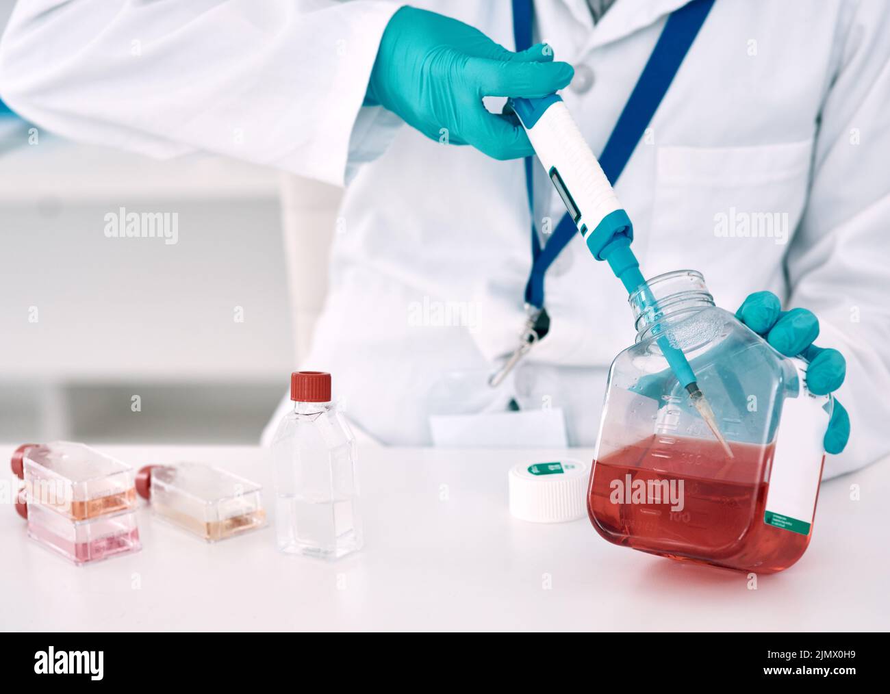 Shes a expert in conducting medical tests. an unrecognizable female ...