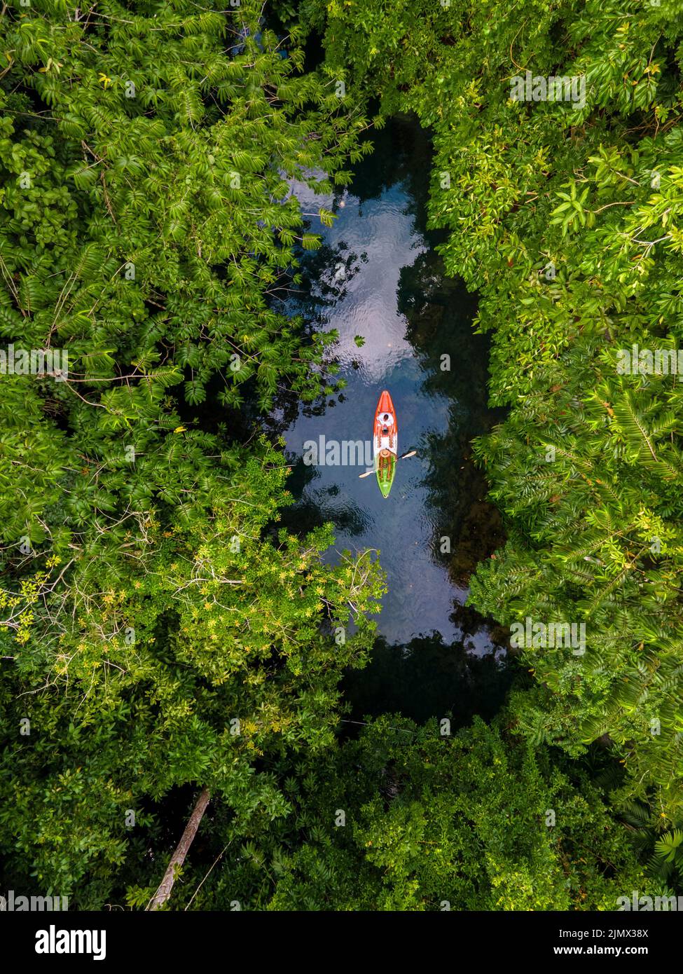 Couple in kayak in the jungle of Krabi Thailand, men and woman in kayak ...