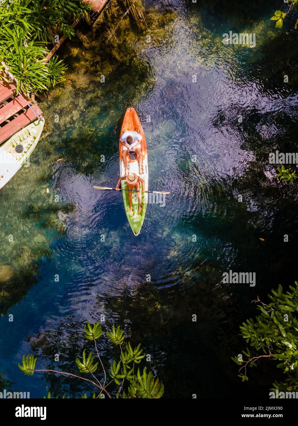 Couple in kayak in the jungle of Krabi Thailand, men and woman in kayak ...