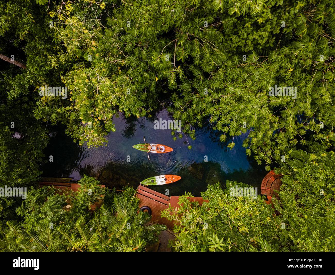 Couple in kayak in the jungle of Krabi Thailand, men and woman in kayak ...