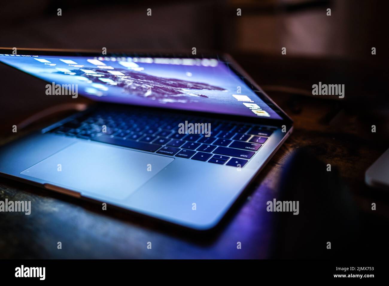 Glowing blue Laptop keyboard image Stock Photo - Alamy