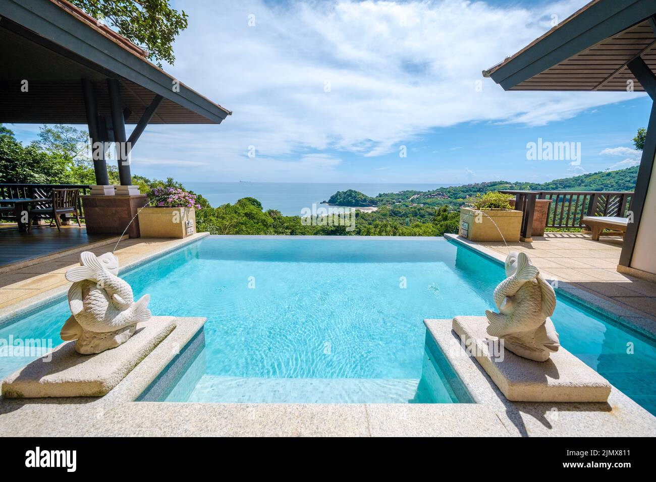 Koh Lanta Thailand, luxury beach chairs by the swimming pool of an ...