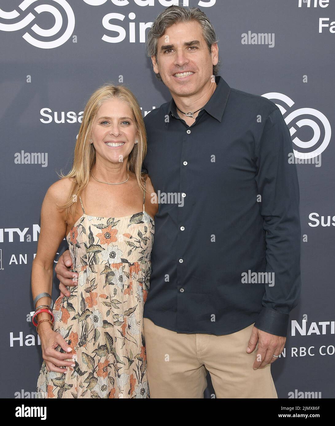 (L-R) Liz Gottainer and Danny Zoller at the Cedars-Sinai Board Of ...