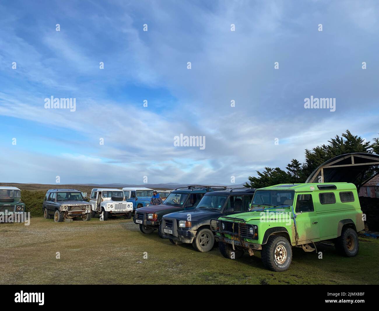 Horseshoe Bay, UK. 17th June, 2022. Michael Goss (back), farmer and ...