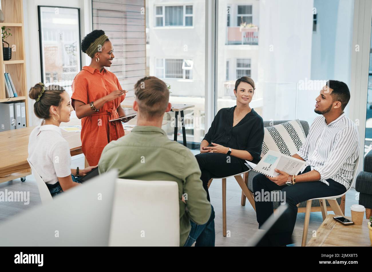 We make sure to listen to eachother. a diverse group of businesspeople ...