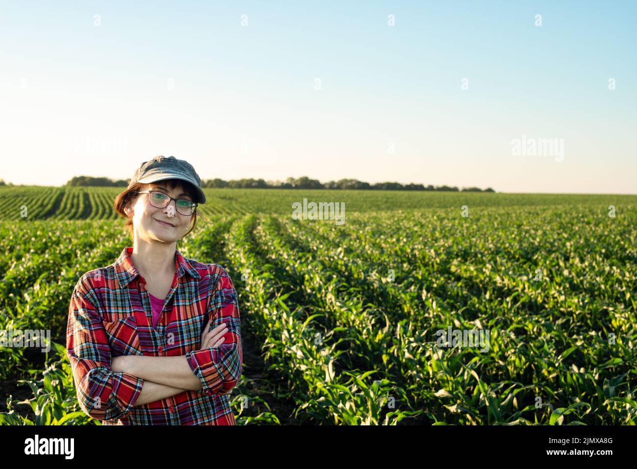 Middle age female caucasian confident satisfied smiling farm worker ...