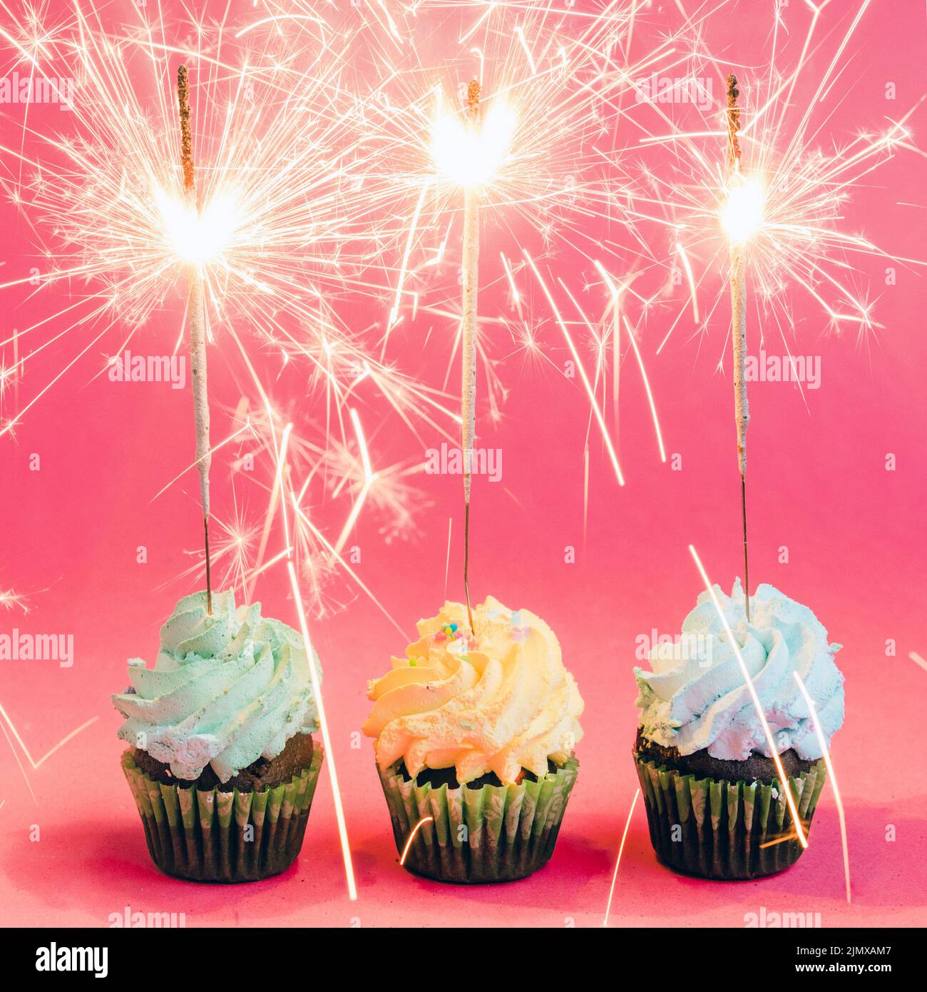 Cupcakes with sparklers Stock Photo - Alamy