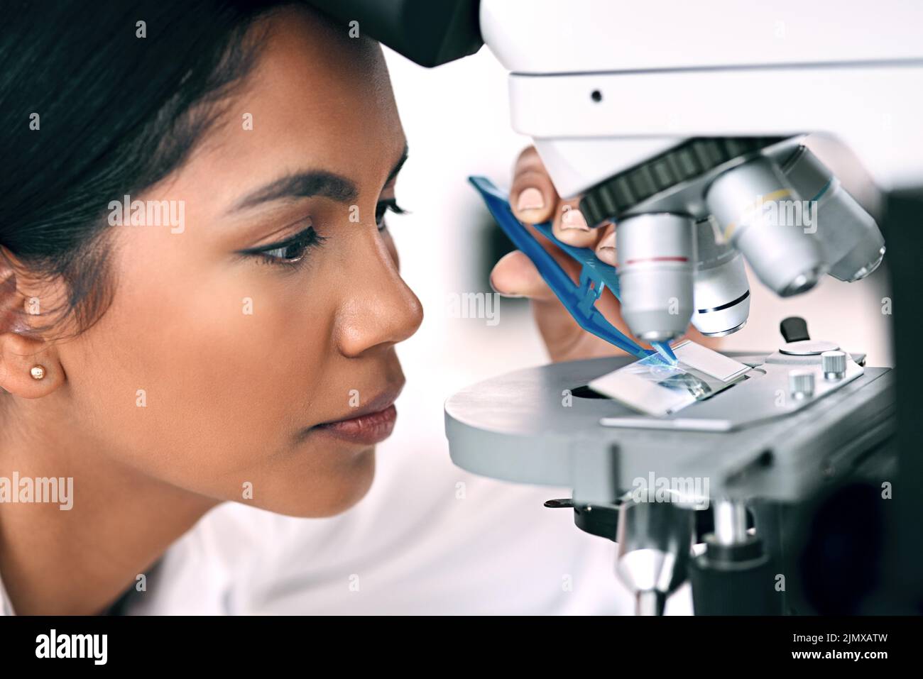 Time to do some serious investigation. Closeup shot of an attractive ...