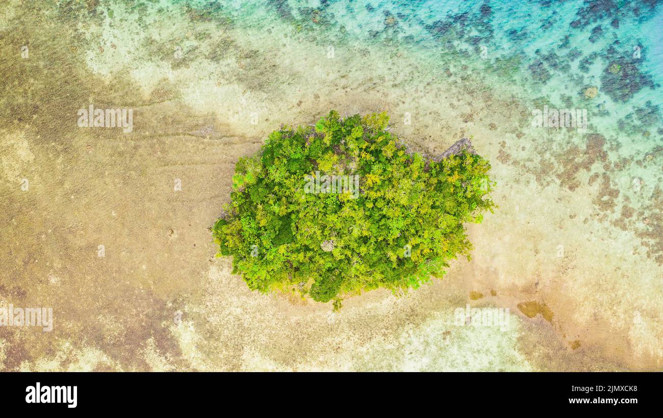 Make a stop at every island and islet. High angle shot of a little ...
