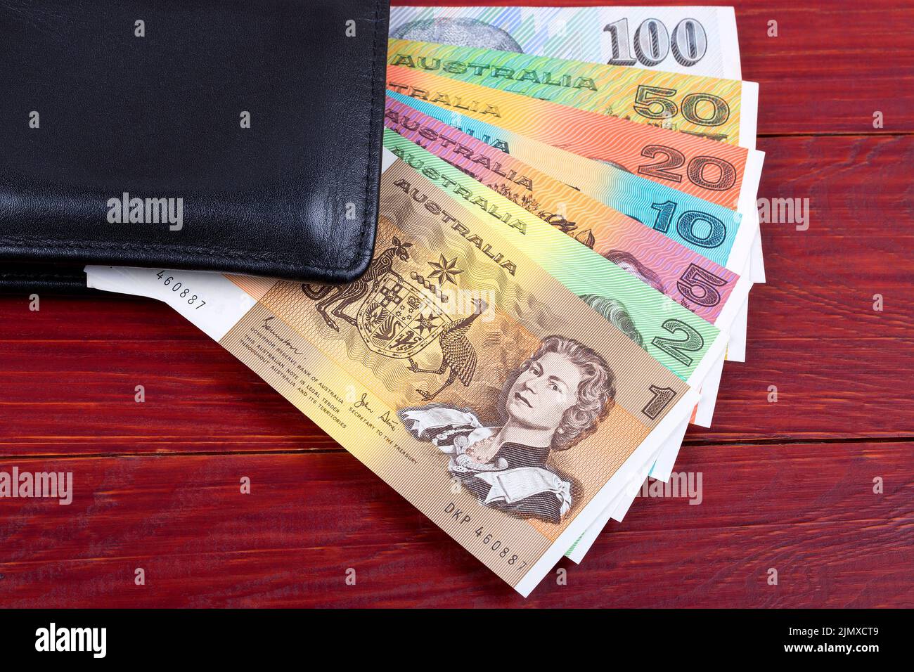 Old Australian money in the black wallet Stock Photo - Alamy