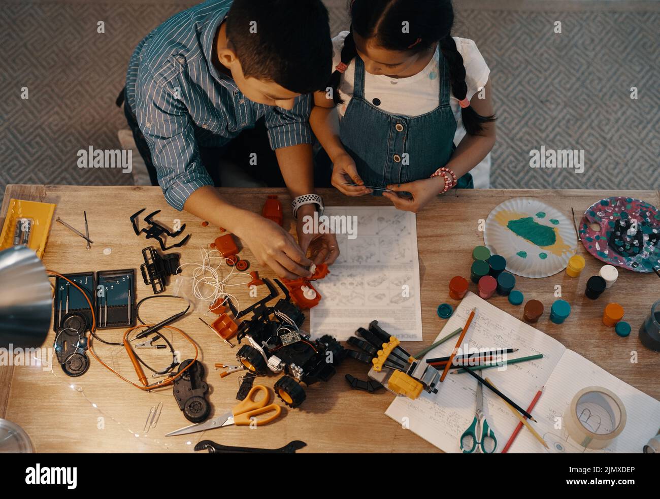 Our project is coming together piece by piece. High angle shot of two ...