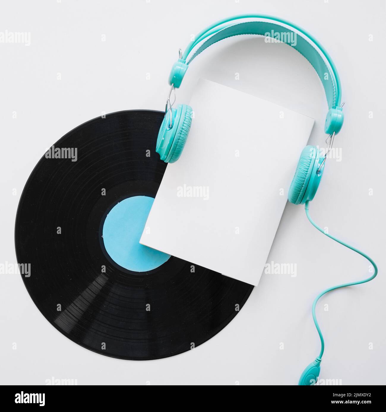 Booklet mockup with headphones vinyl Stock Photo - Alamy