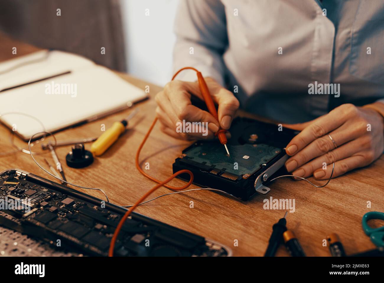 Sell save the data too. an unrecognizable female computer technician ...