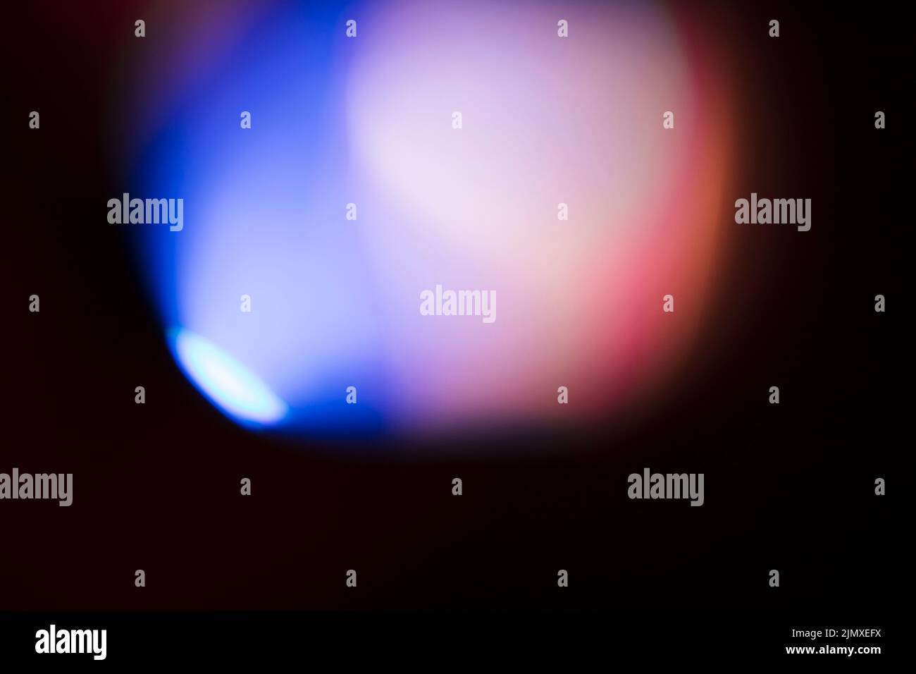 Bright light black background Stock Photo - Alamy