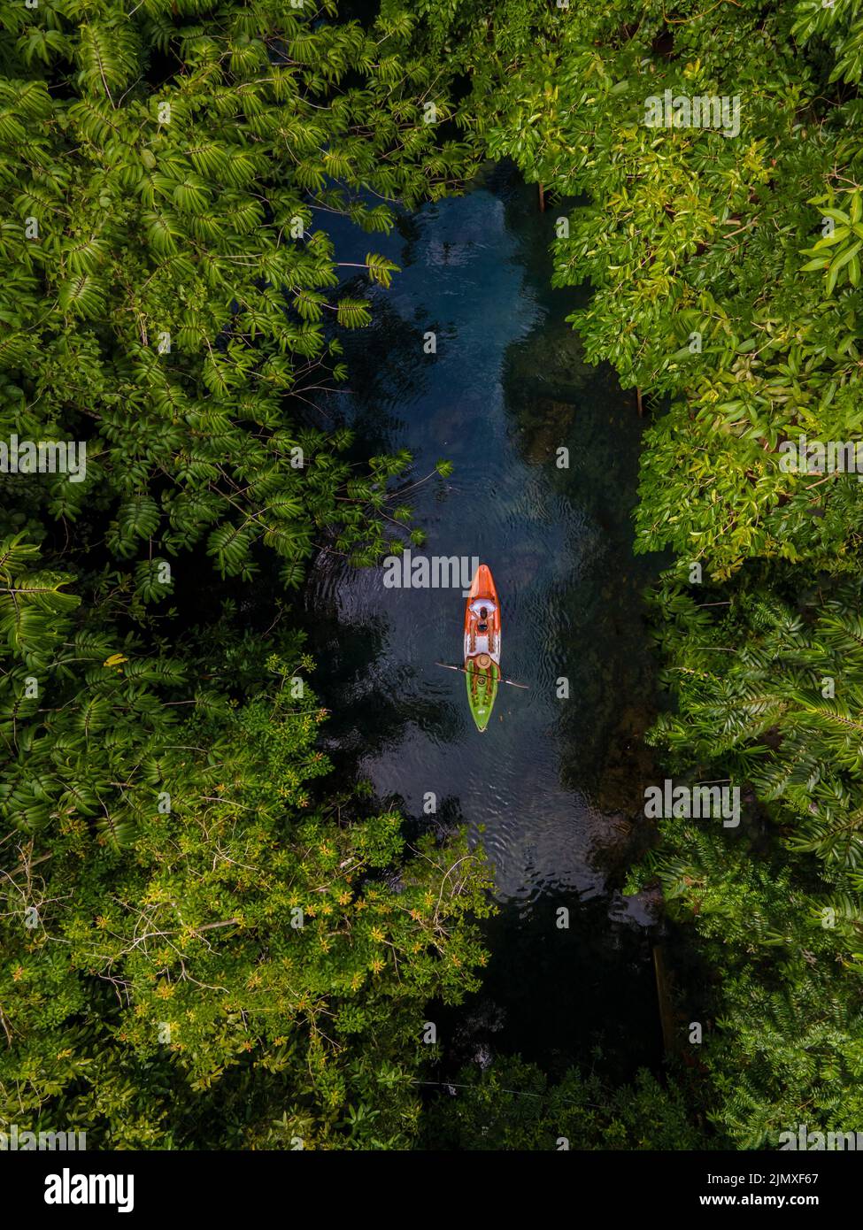 Couple in kayak in the jungle of Krabi Thailand, men and woman in kayak ...