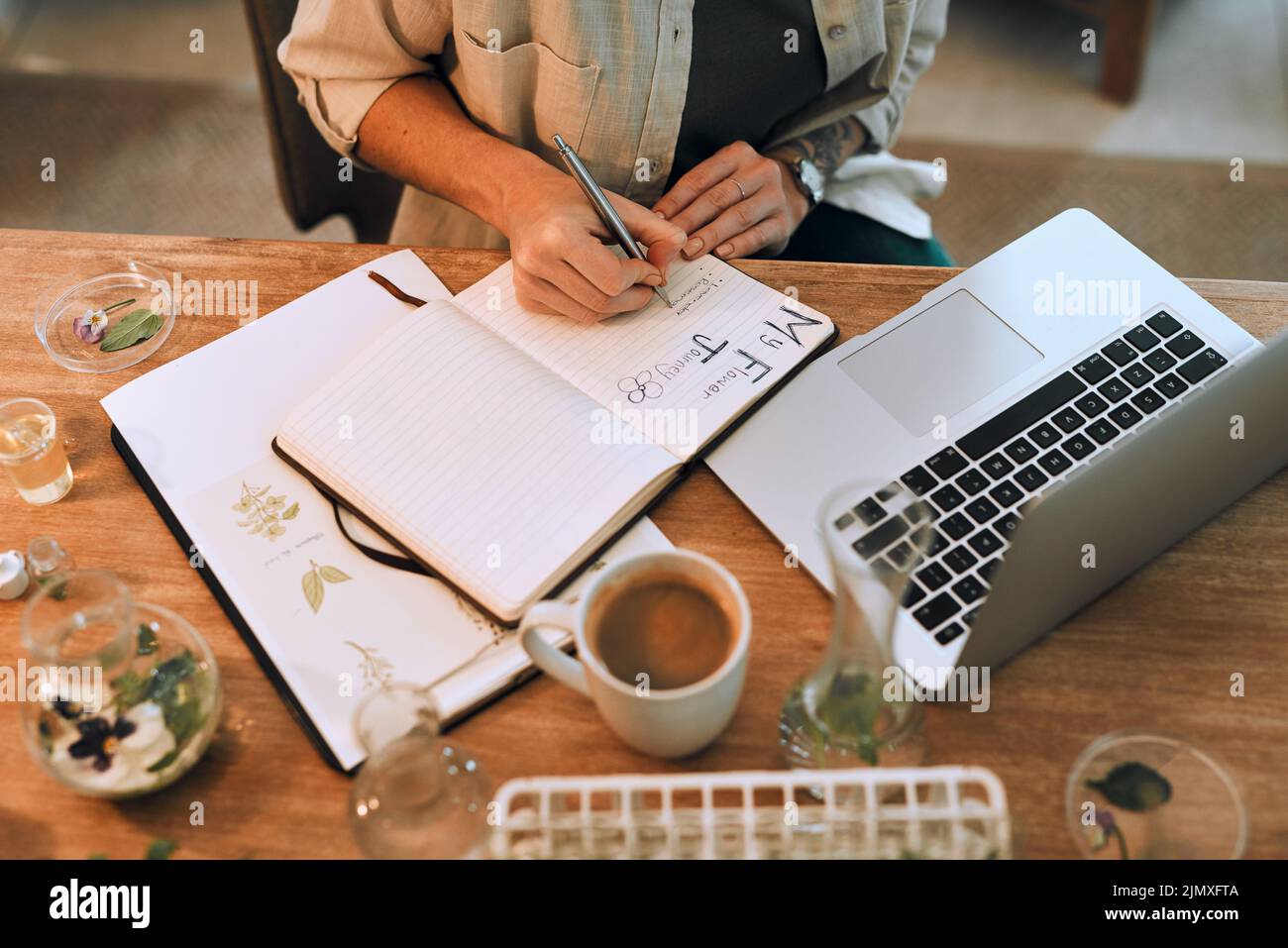 I dot down my findings every day. an unrecognizable botanist doing ...