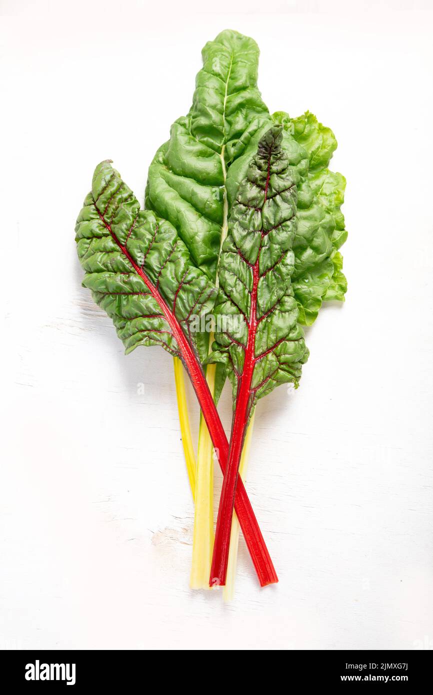 Raw chard on light background. Highly nutritious leaves. Popular ...
